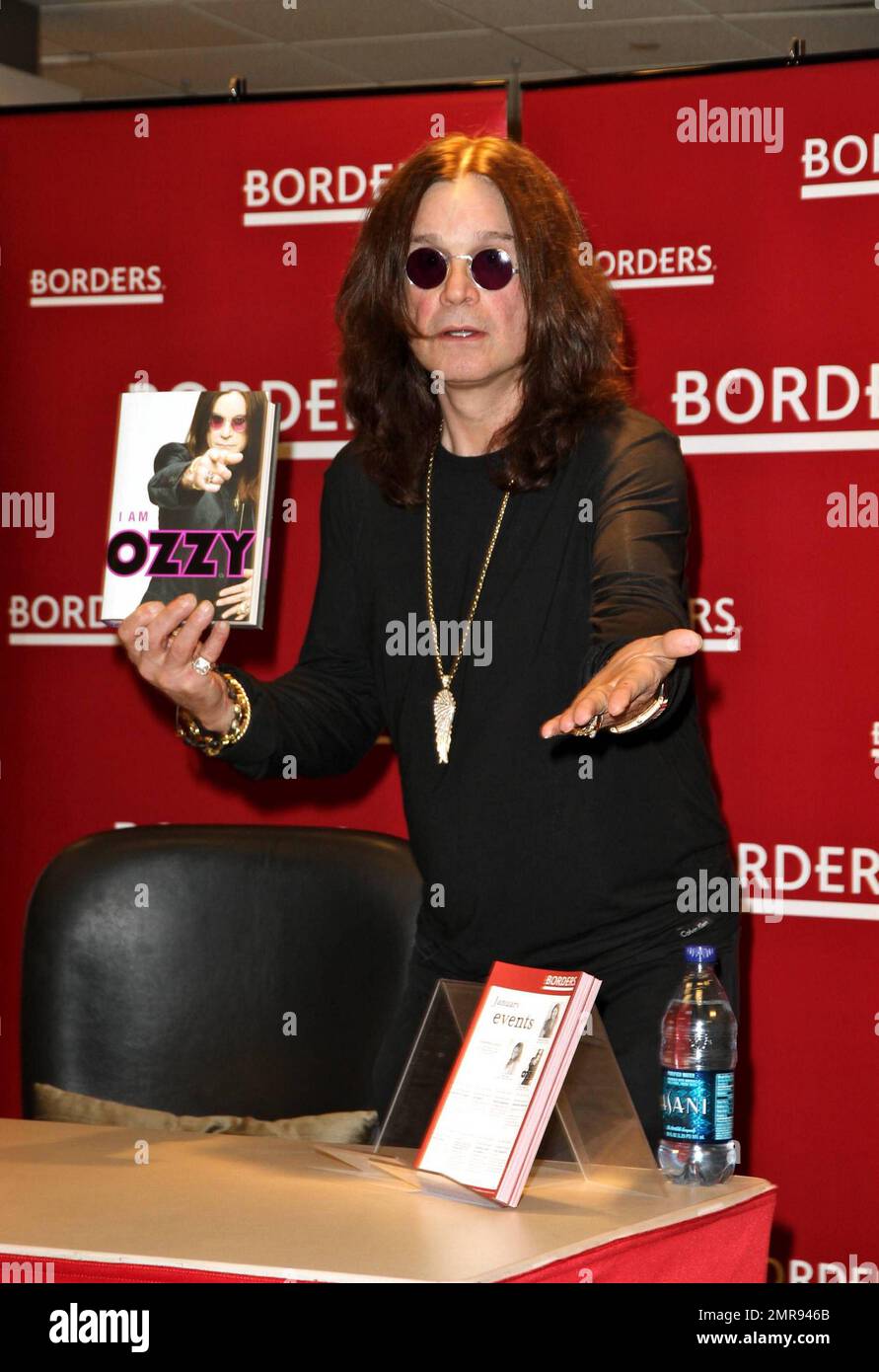 Ozzy Osbourne signs copies of his book "I Am Ozzy" at Borders Books ...