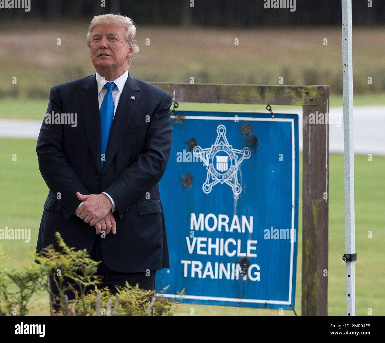 President Donald Trump watches as he tours the Moran Vehicle Training ...