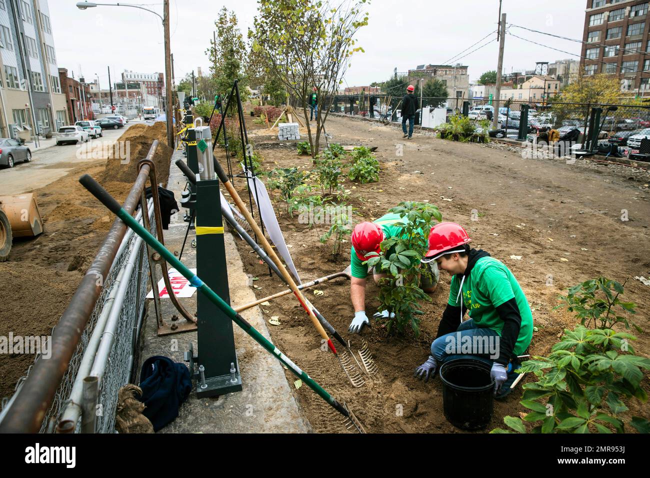 Volunteers from Timberland, who were organized by The Center City ...