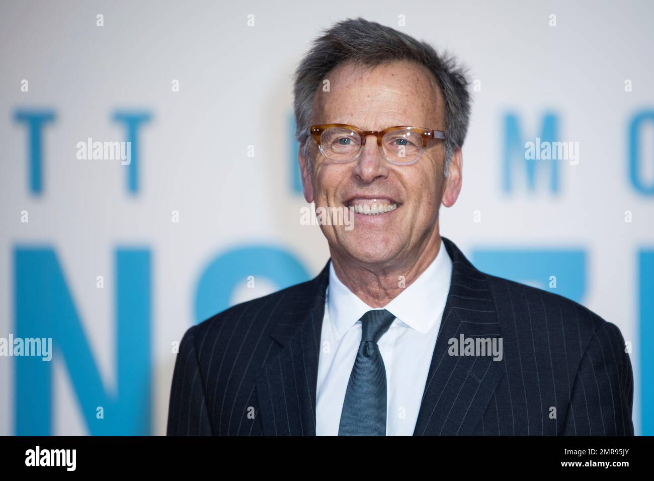 Mark Johnson poses for photographers upon arrival at the premiere of ...