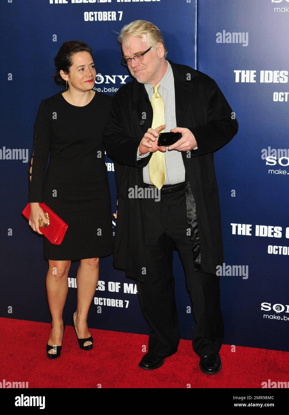 Mimi O'Donnell and Philip Seymour Hoffman at the premiere of "The Ides of March" held at the ...