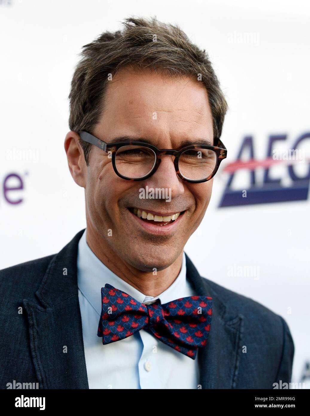 Actor Eric McCormack poses at the five-year anniversary of the non ...