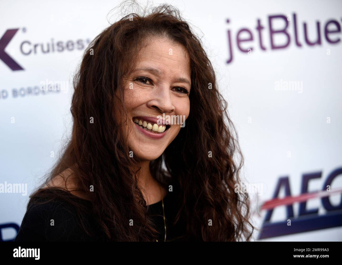 Figure skater Tai Babilonia poses at the five-year anniversary of the ...
