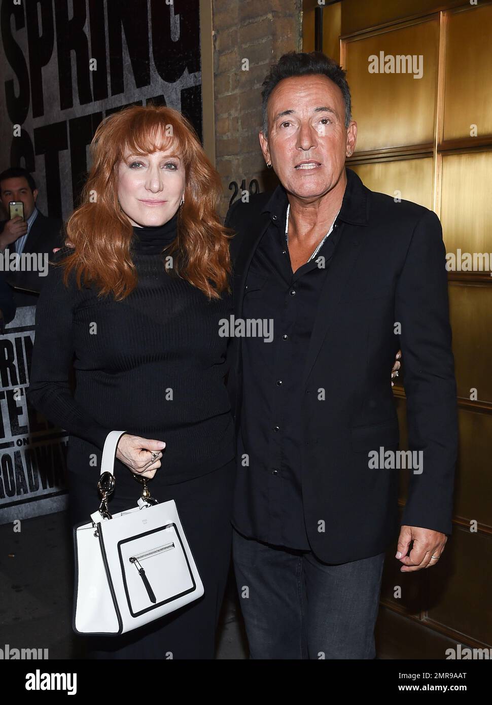 Musician Bruce Springsteen and his wife Patti Scialfa exit out the ...