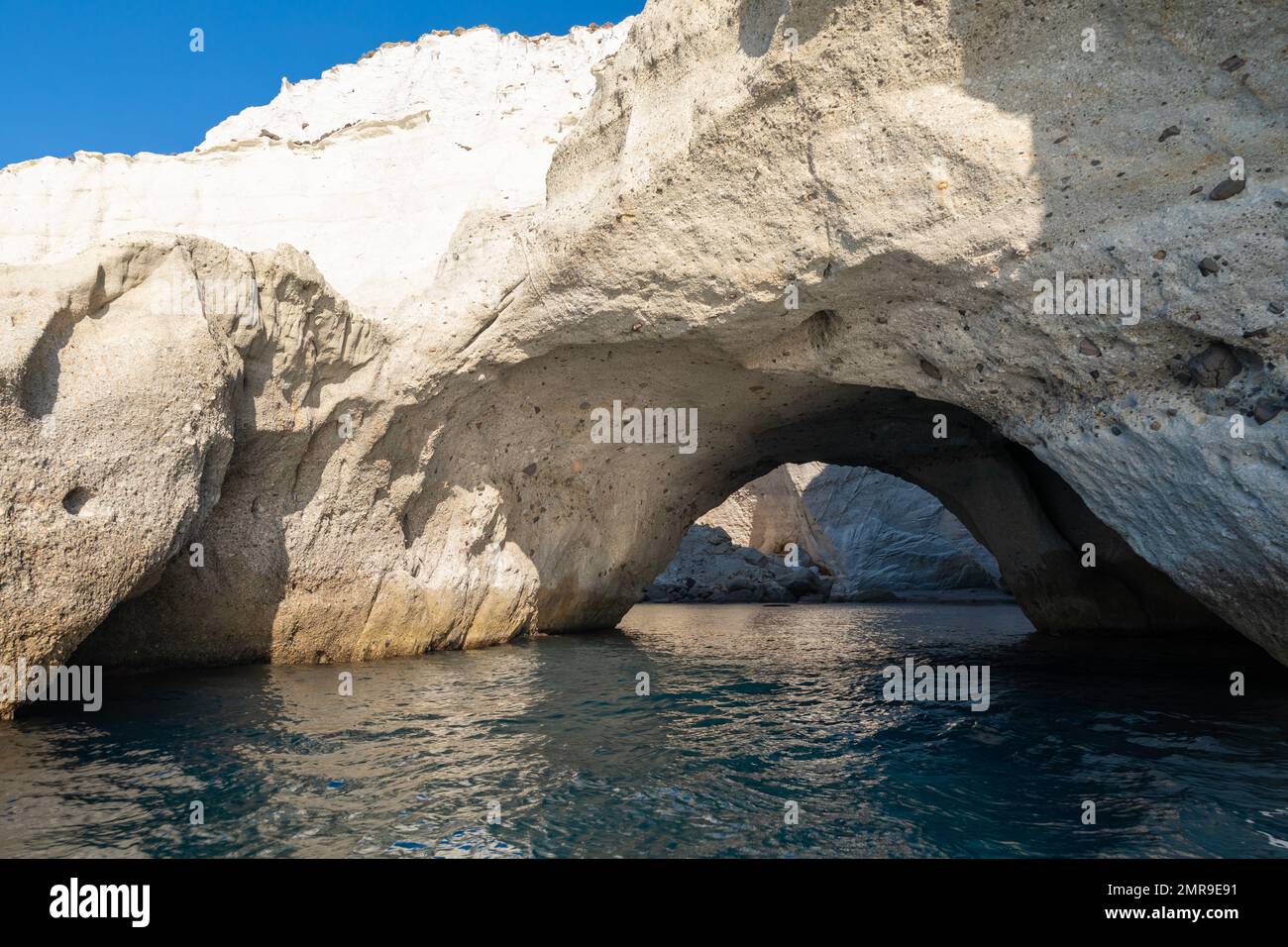 Entrance to the cave of Sykia from the sea, Milos island, Cyclades ...