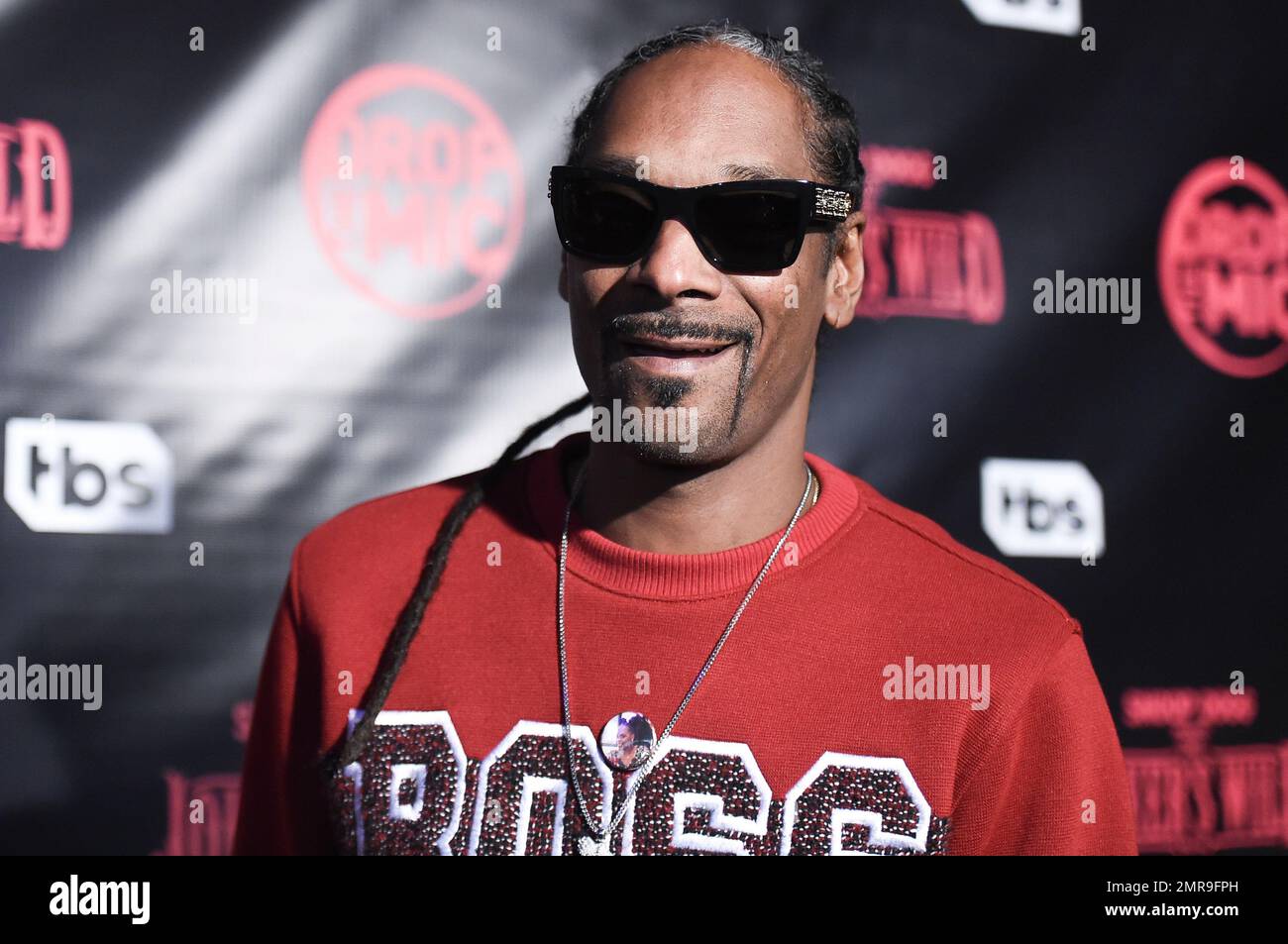 Snoop Dogg attends a red carpet event for "Drop the Mic" and "The Joker ...