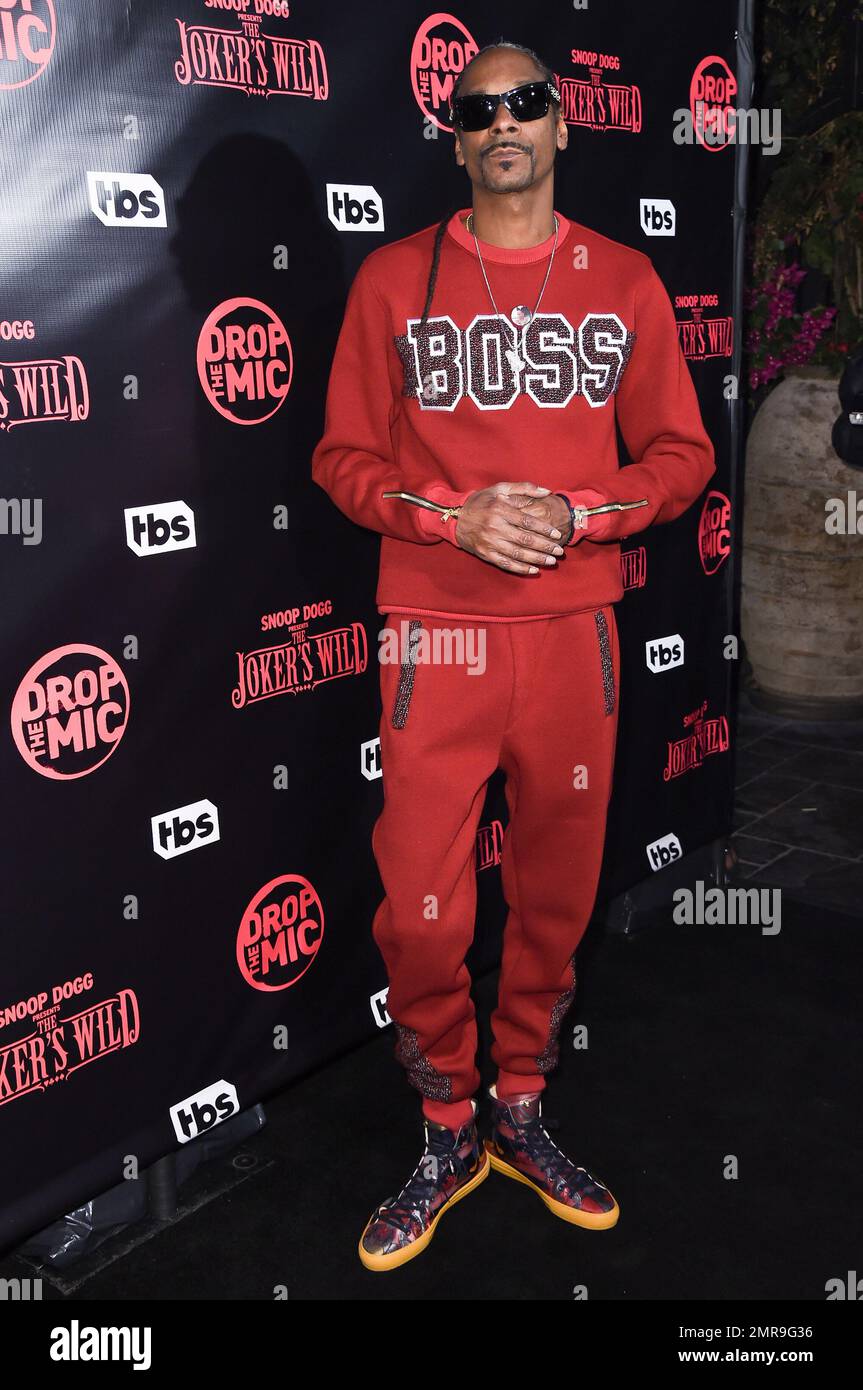 Snoop Dogg attends a red carpet event for "Drop the Mic" and "The Joker ...