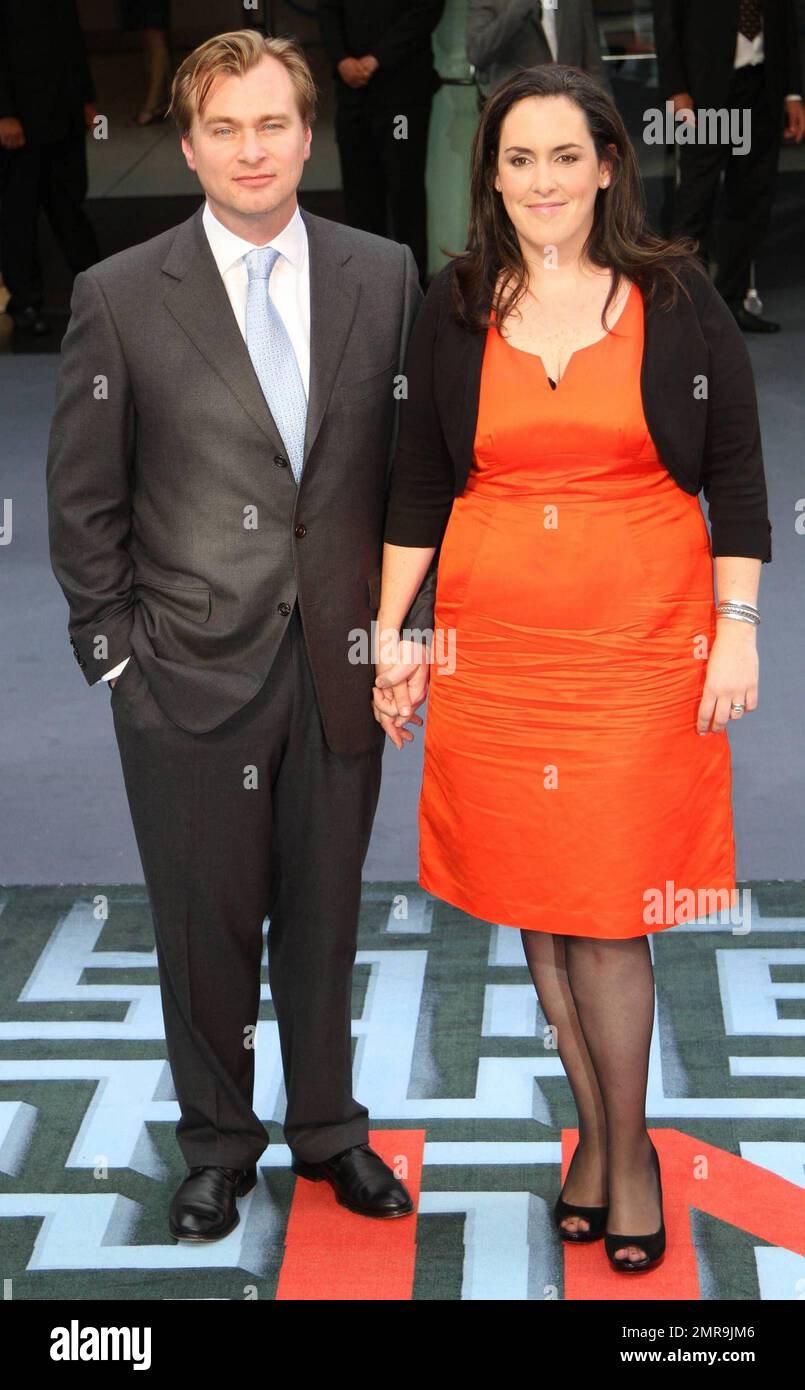 Director Christopher Nolan and wife Emma Thomas walk the red carpet for ...
