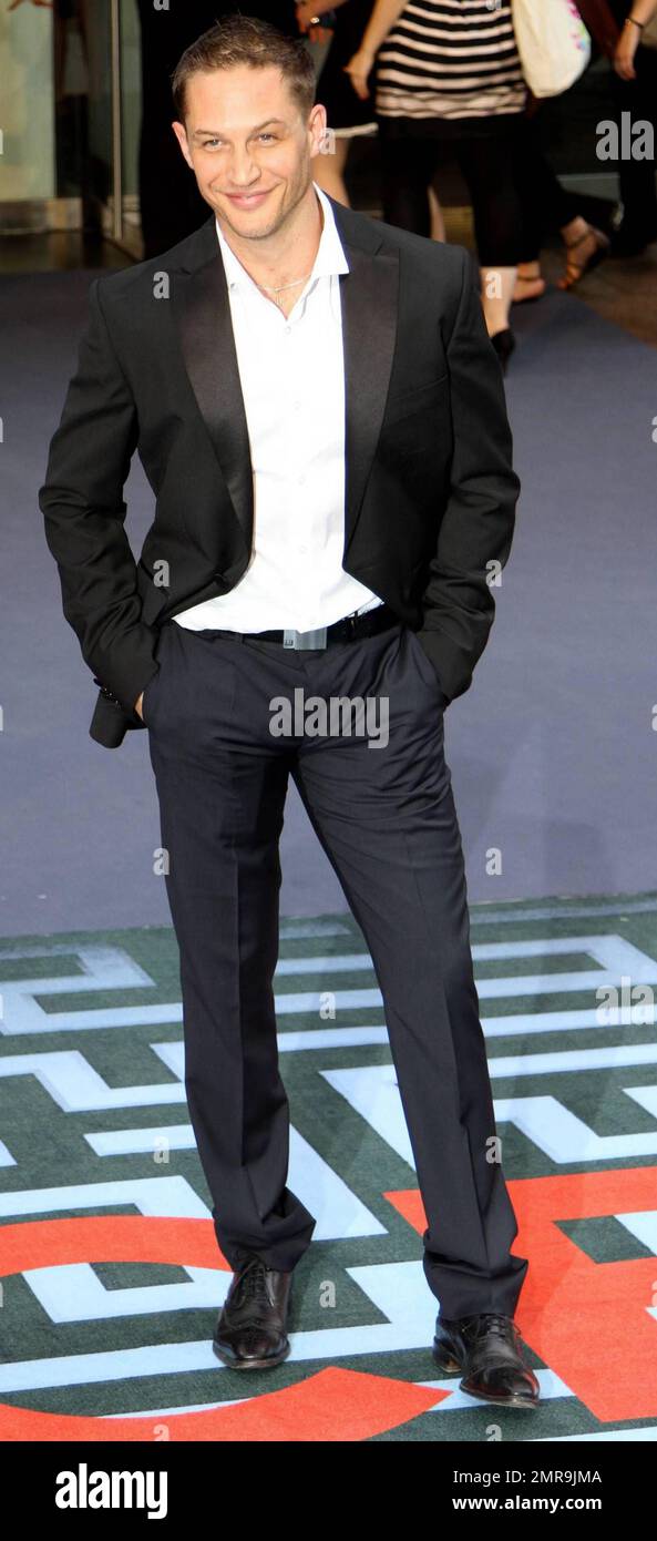 Tom Hardy walks the red carpet for the UK premiere of the new Warner ...