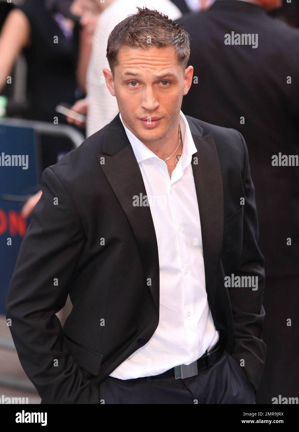 Tom Hardy walks the red carpet for the UK premiere of the new Warner ...