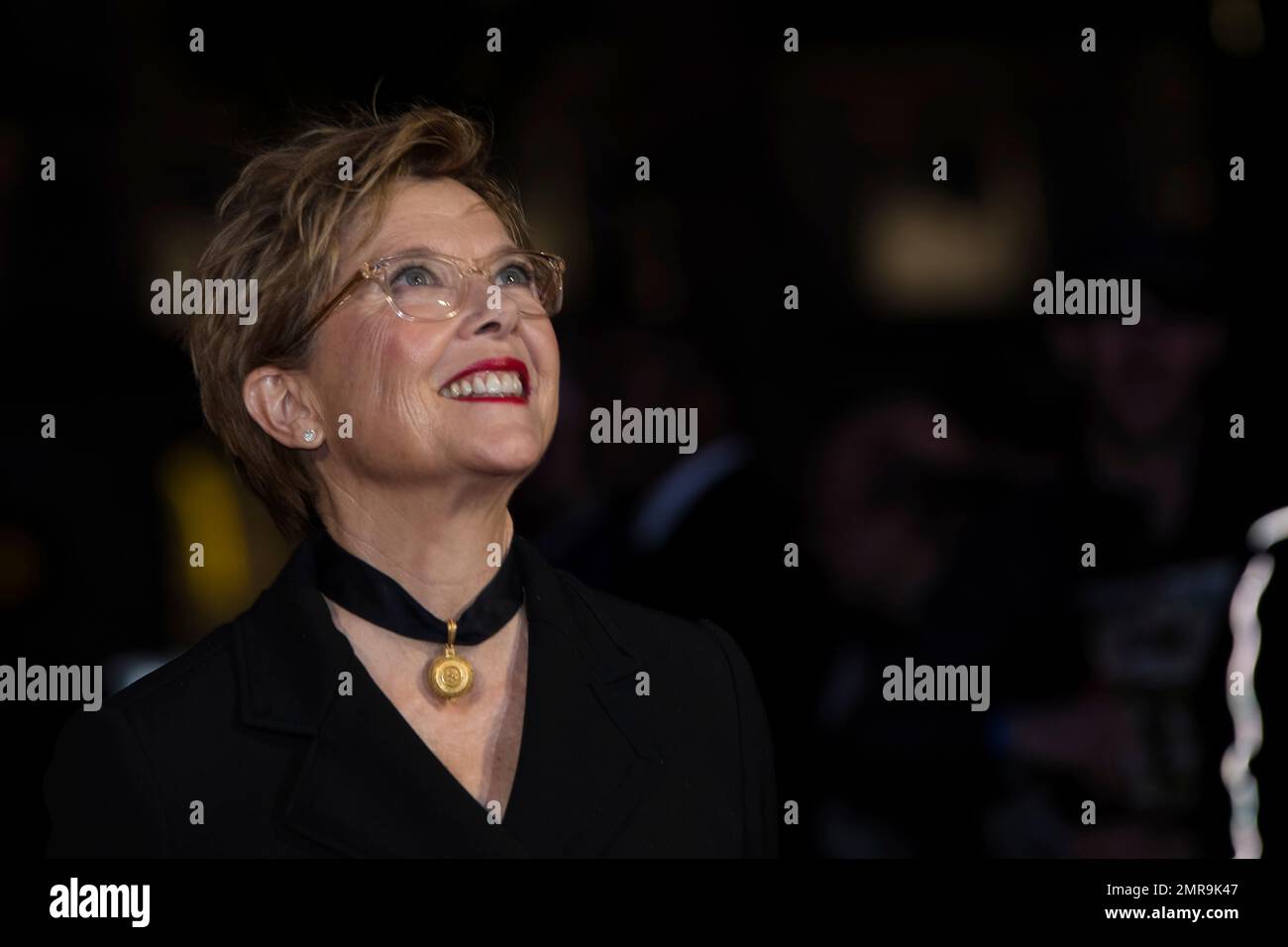 Actress Annette Bening poses for photographers upon arrival at the ...