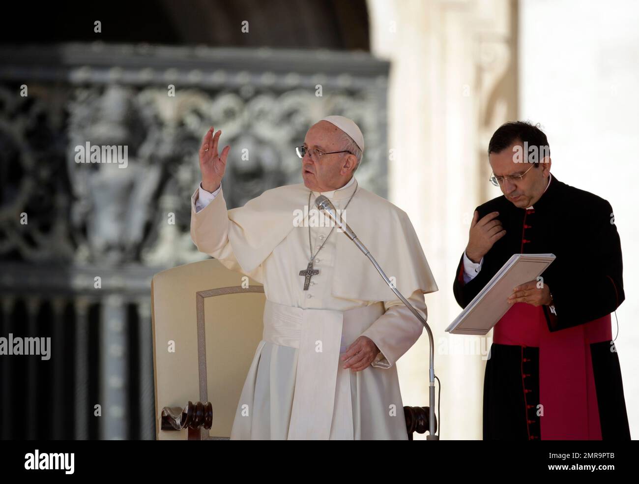 Pope Francis delivers his blessing during his weekly general audience ...