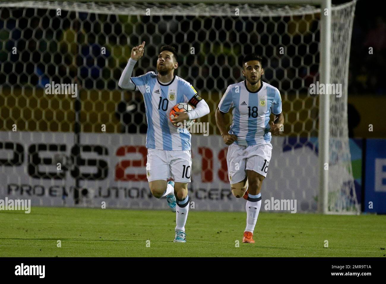 Argentina's Lionel Messi, left, celebrates after scoring against ...