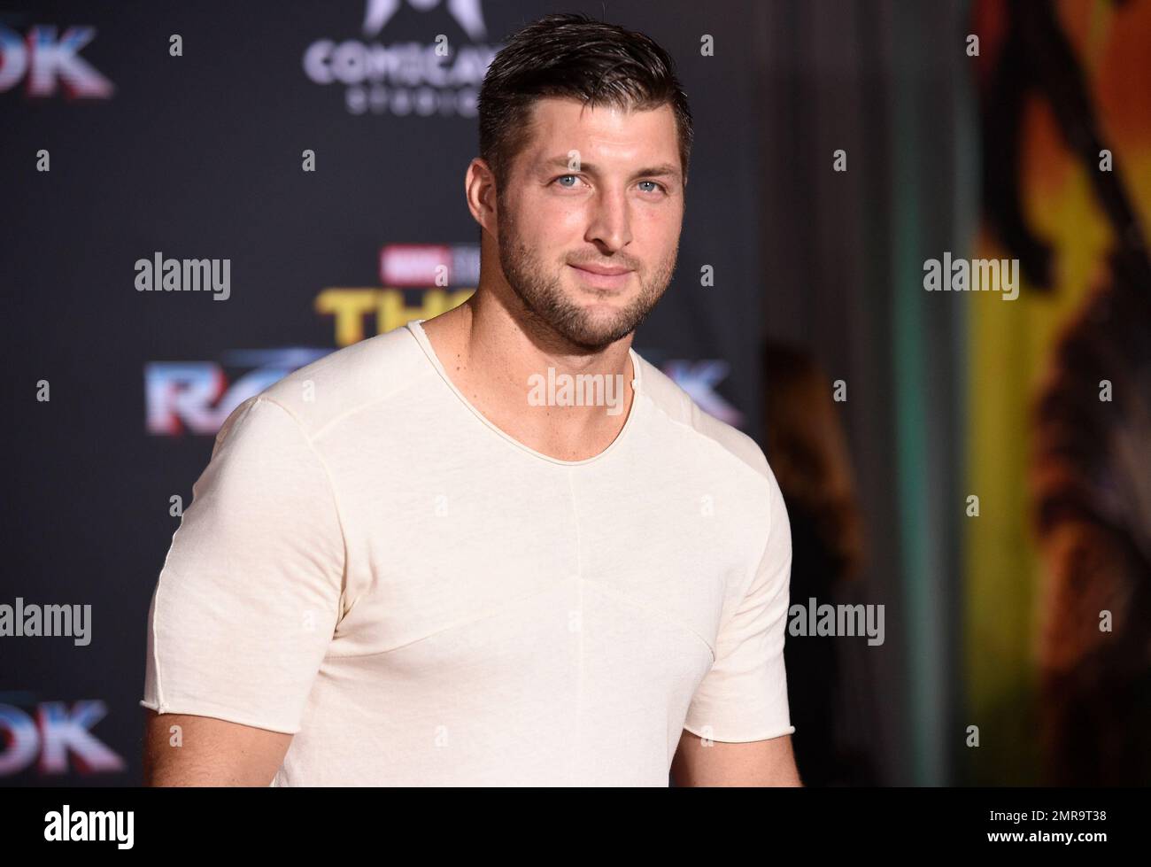 Tim Tebow arrives at the world premiere of "Thor: Ragnarok" at the El ...
