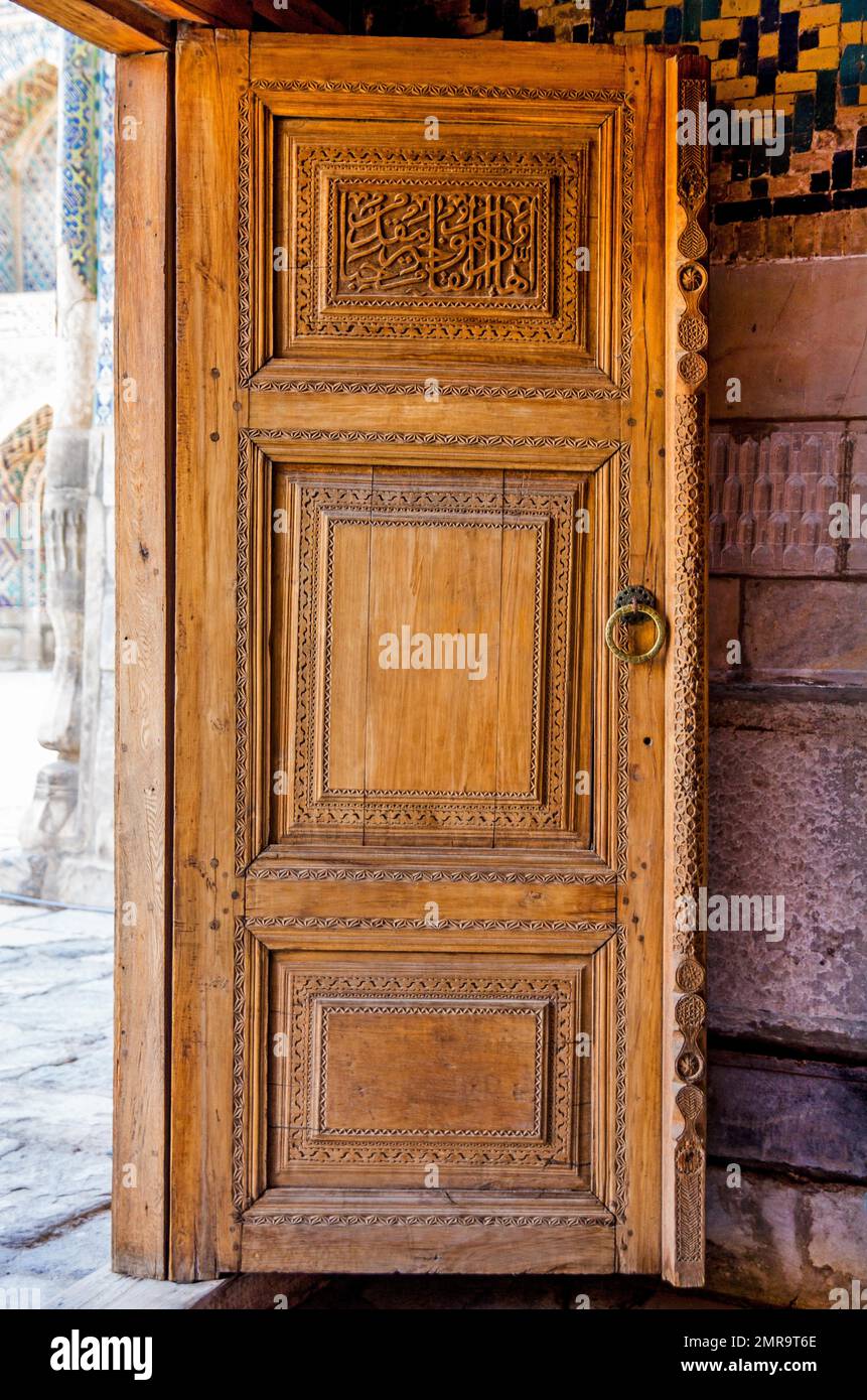 Wooden door, Tillakori Medrese, Registan Square, ensemble of three ...