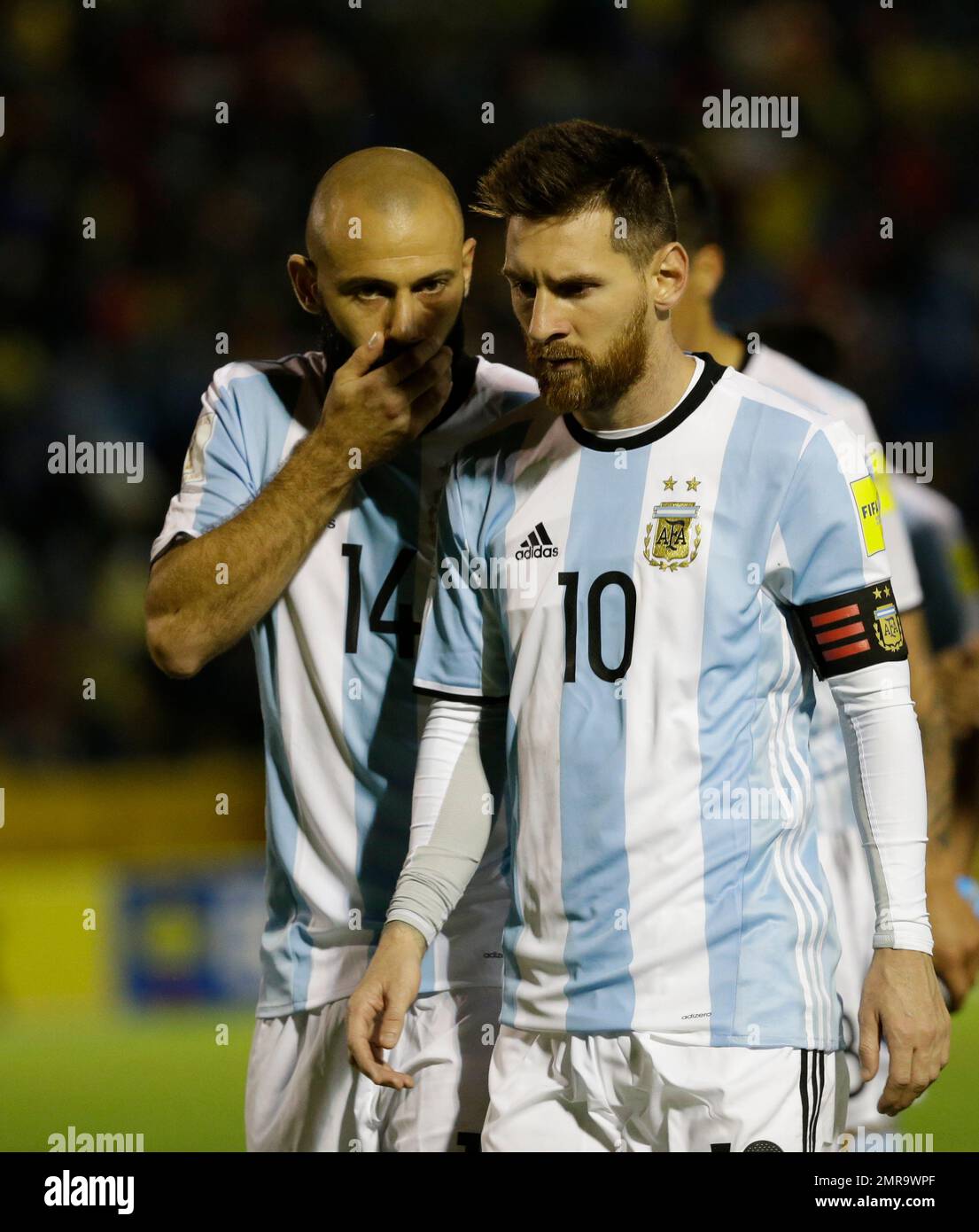 Argentina's Javier Mascherano, left, talks with Argentina's Lionel ...