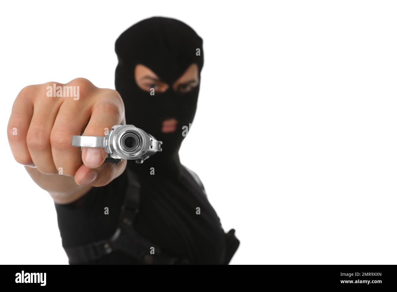 Professional killer with gun on white background Stock Photo - Alamy