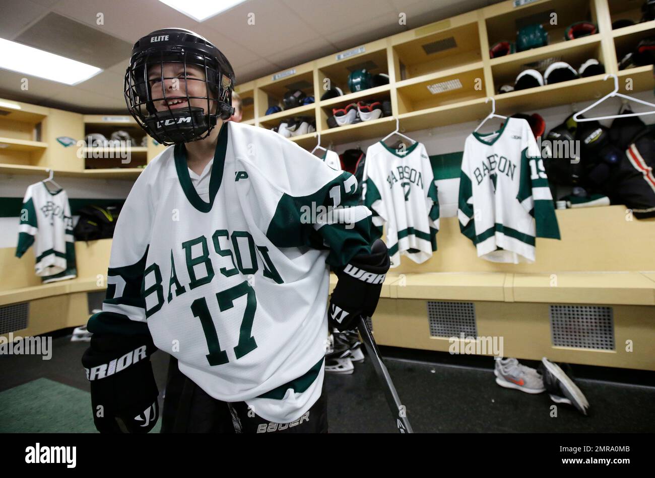 Coleman Walsh, 10, of Walpole, Mass., left, steps out of the Babson ...