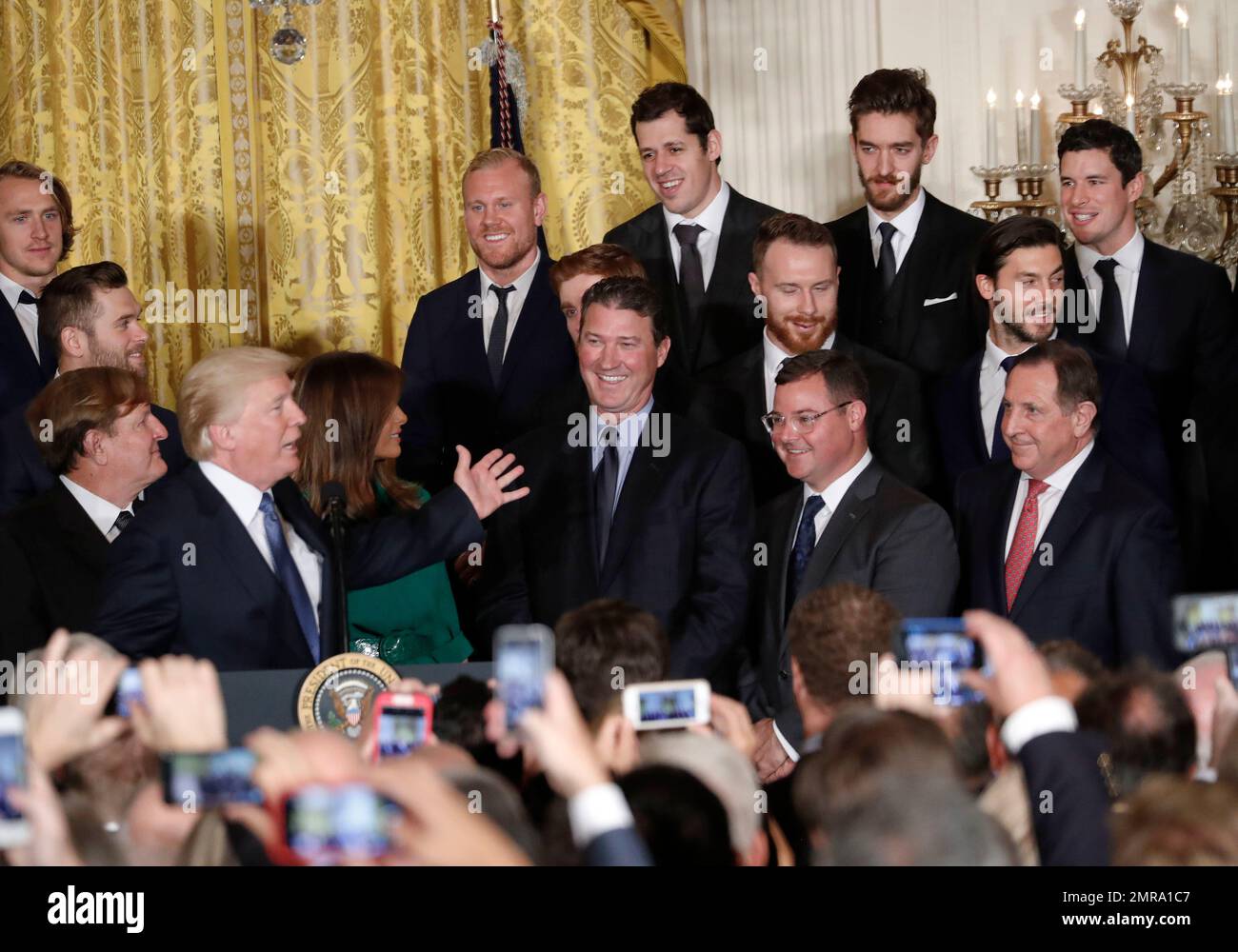 President Donald Trump, left, turns around to acknowledge Pittsburgh ...