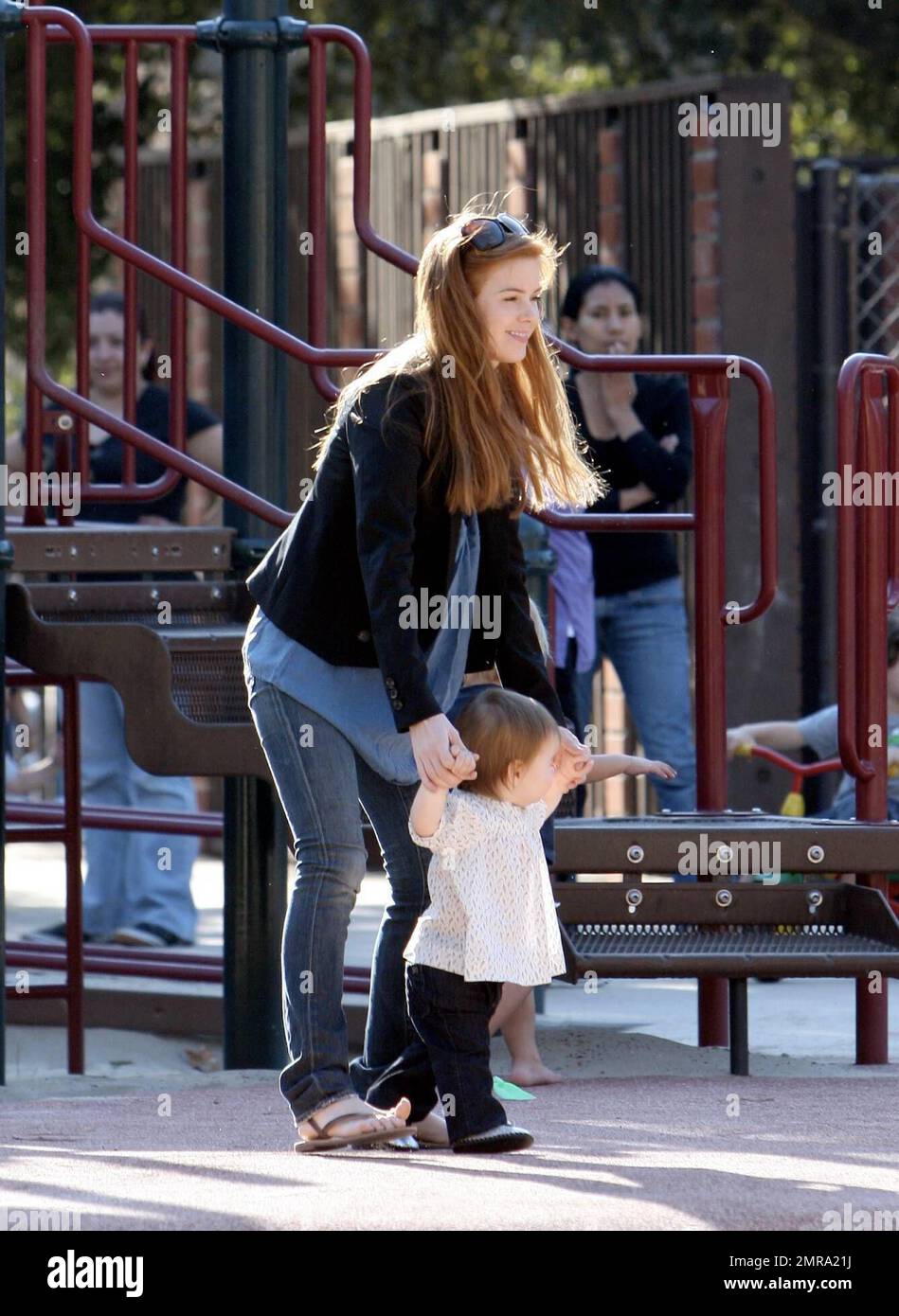Actress Isla Fisher plays with her adorable daughter Olive Cohen, who ...