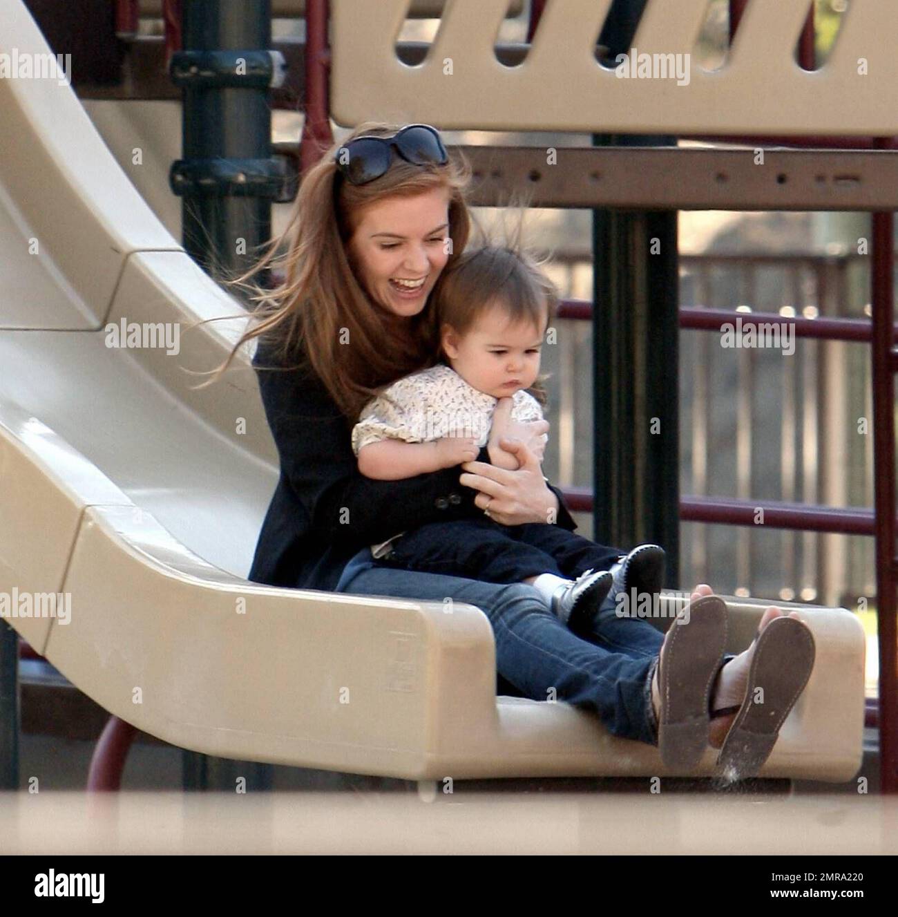 Actress Isla Fisher plays with her adorable daughter Olive Cohen, who ...