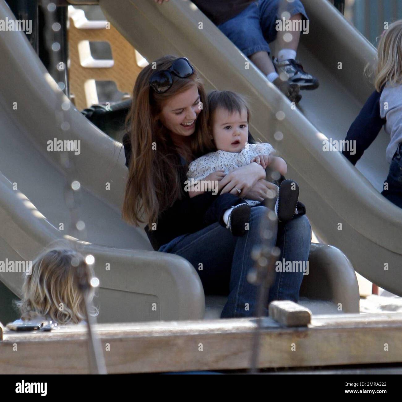 Actress Isla Fisher plays with her adorable daughter Olive Cohen, who ...