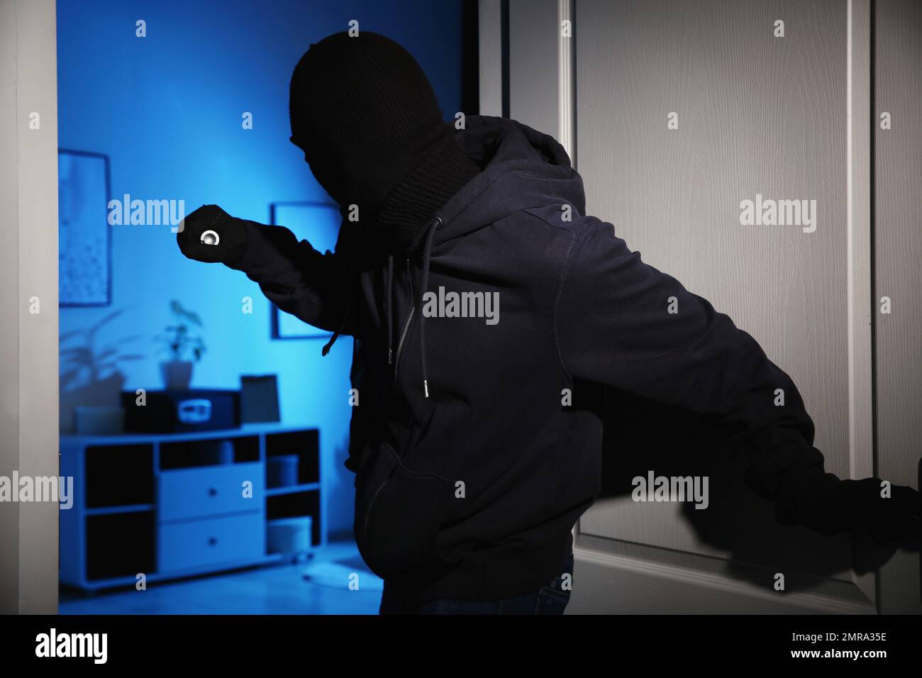 Thief breaking into safe hi-res stock photography and images - Alamy
