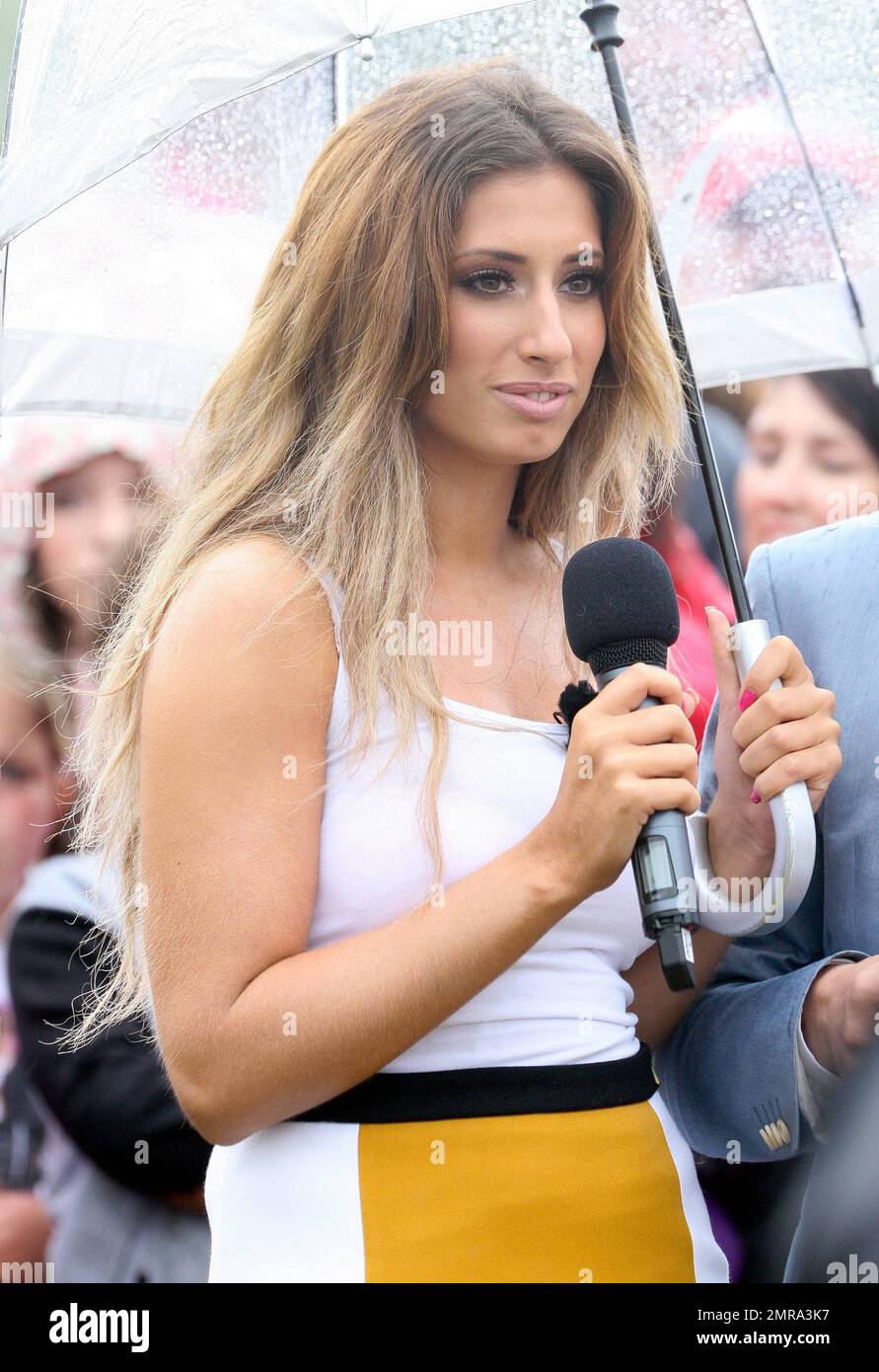 Imogen Thomas, Stacy Solomon and Brian Dowling dodge raindrops as they ...