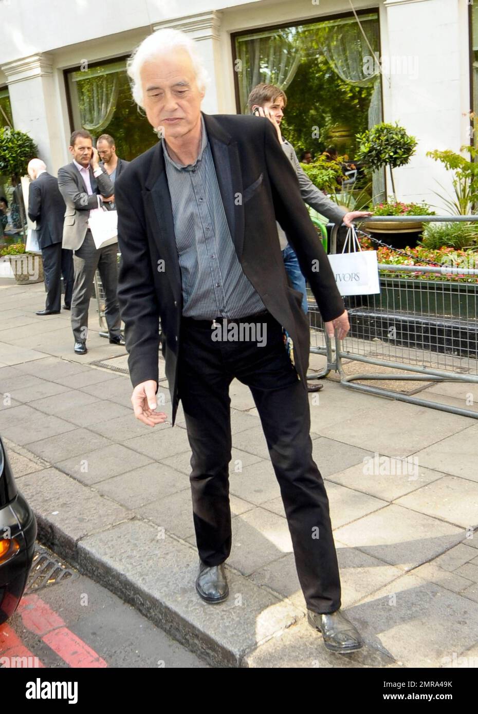 Jimmy Page leaves the Ivor Novello Awards at the Grosvenor House ...