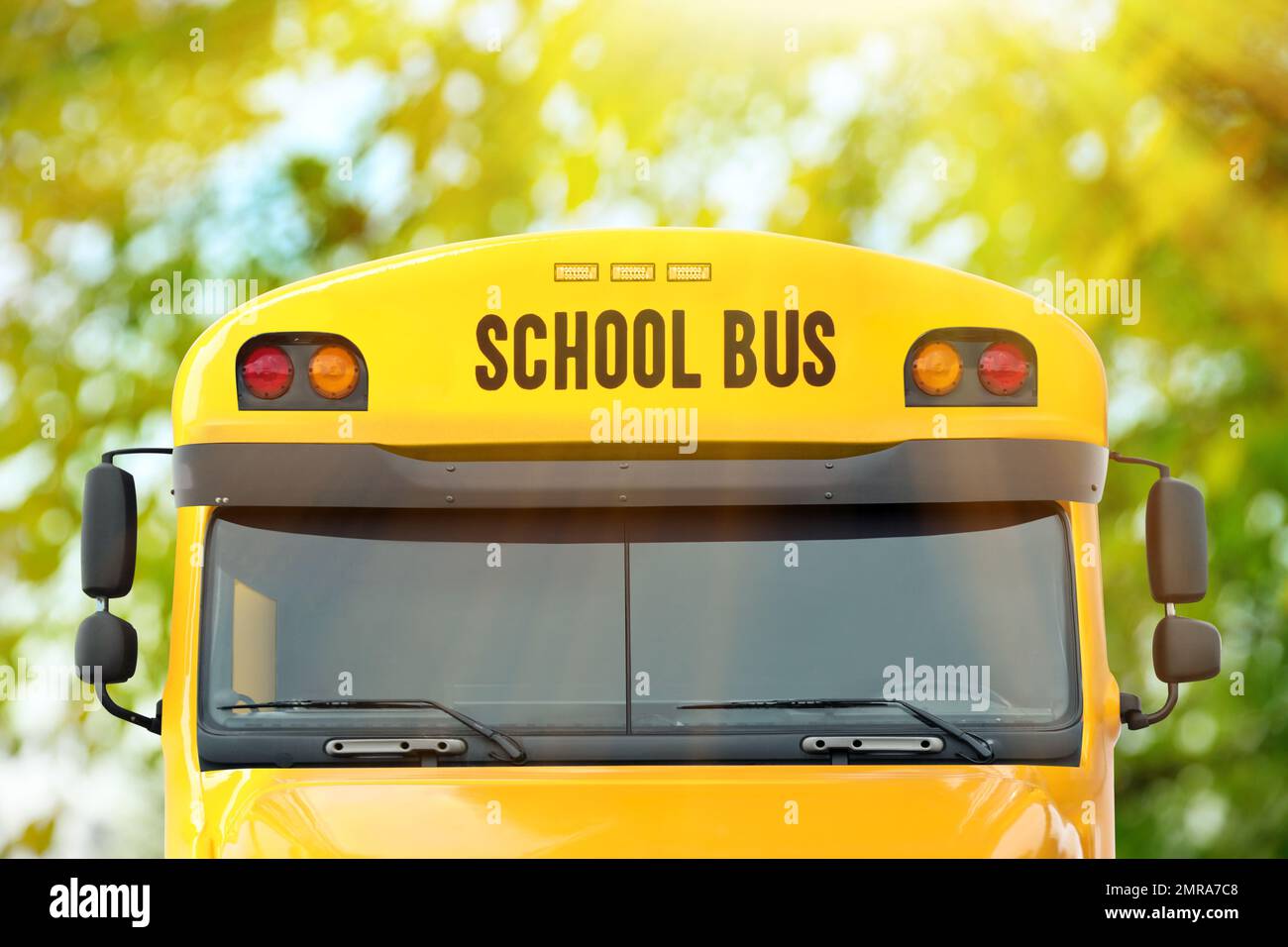Yellow school bus outdoors, closeup. Transport for students Stock Photo ...
