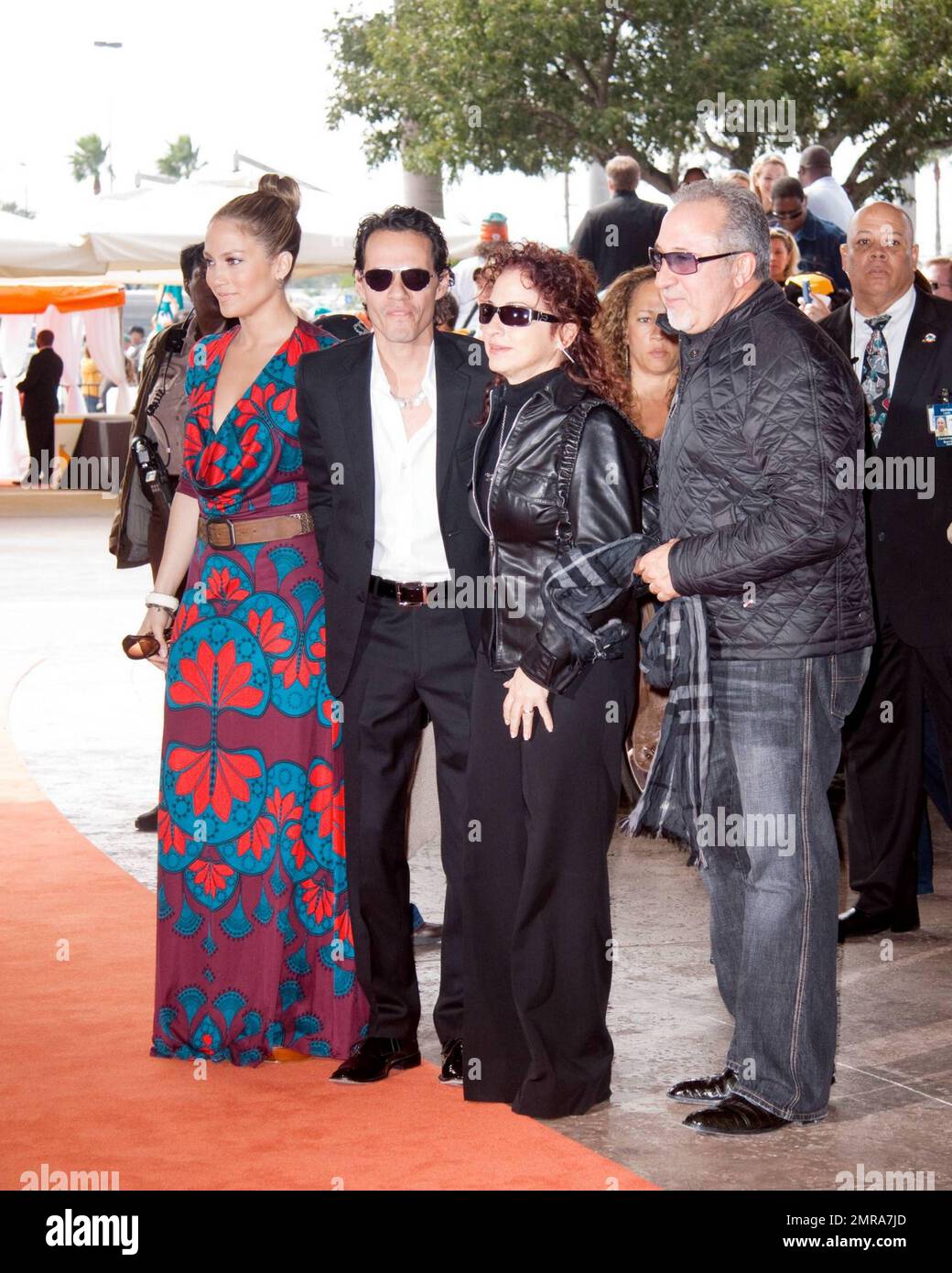 Jennifer Lopez and husband Marc Anthony walk the orange carpet with ...