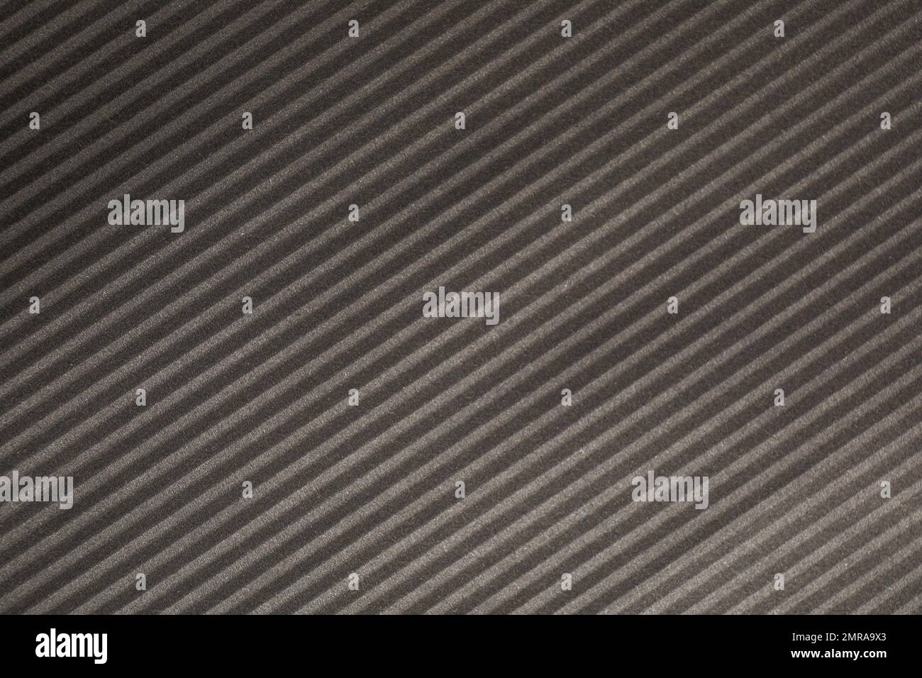 Dark grey corrugated sheet of cardboard as background, closeup Stock ...