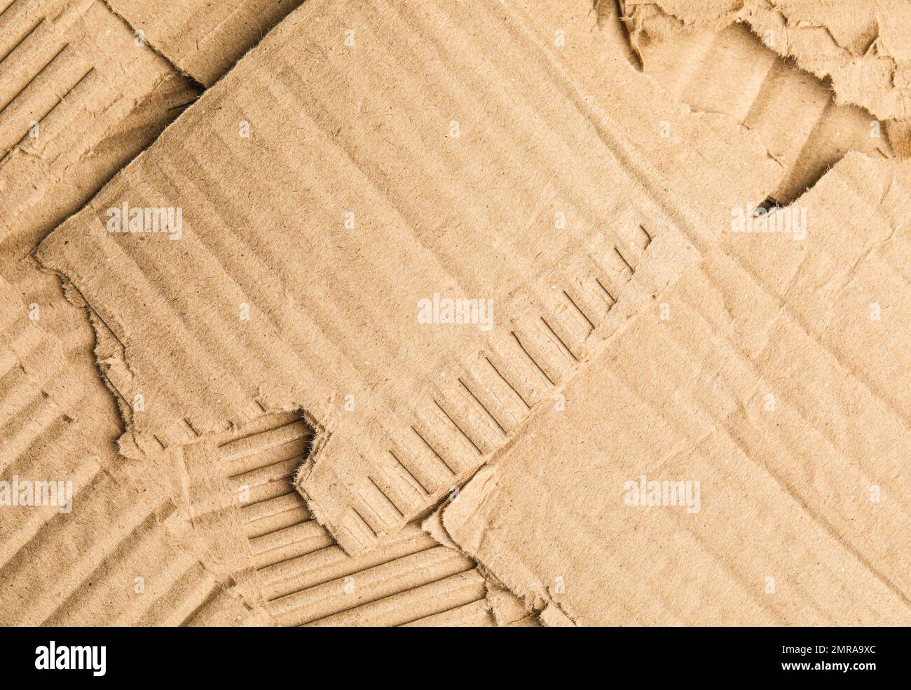 Pieces of torn cardboard as background, top view Stock Photo - Alamy