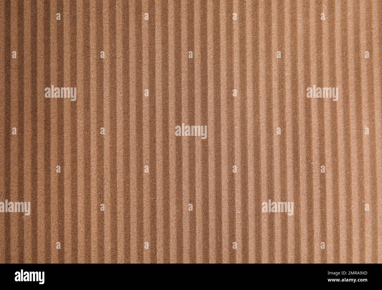 Brown corrugated sheet of cardboard as background, top view Stock Photo ...