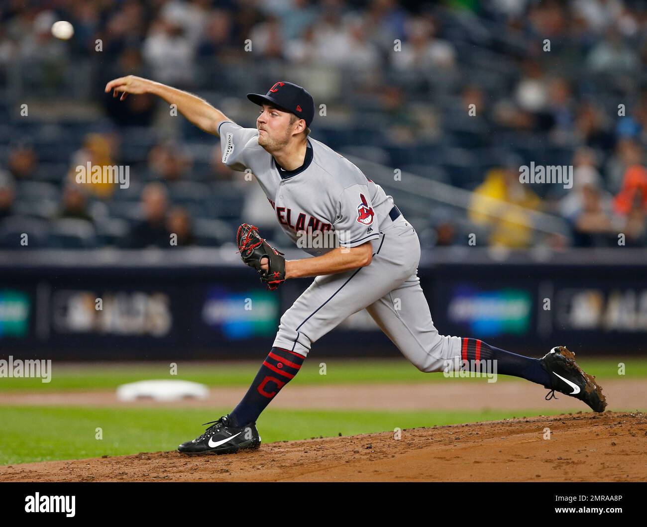 Cleveland Indians pitcher Trevor Bauer delivers against the New York ...