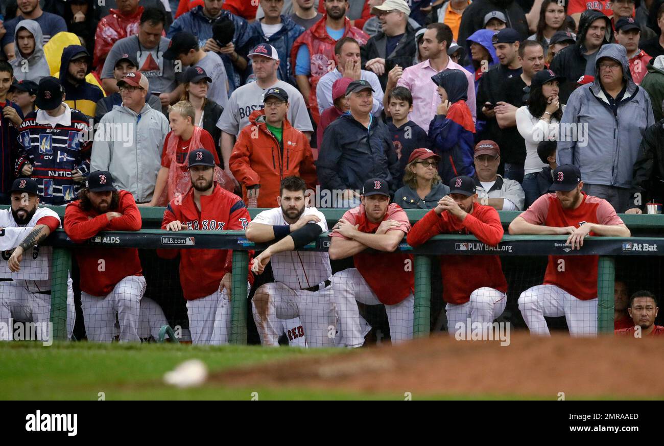 Boston Red Sox players and fans watch the last moments of Game 4 in ...