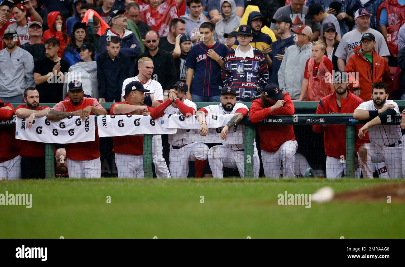 Boston Red Sox players and fans watch the last moments of Game 4 in ...