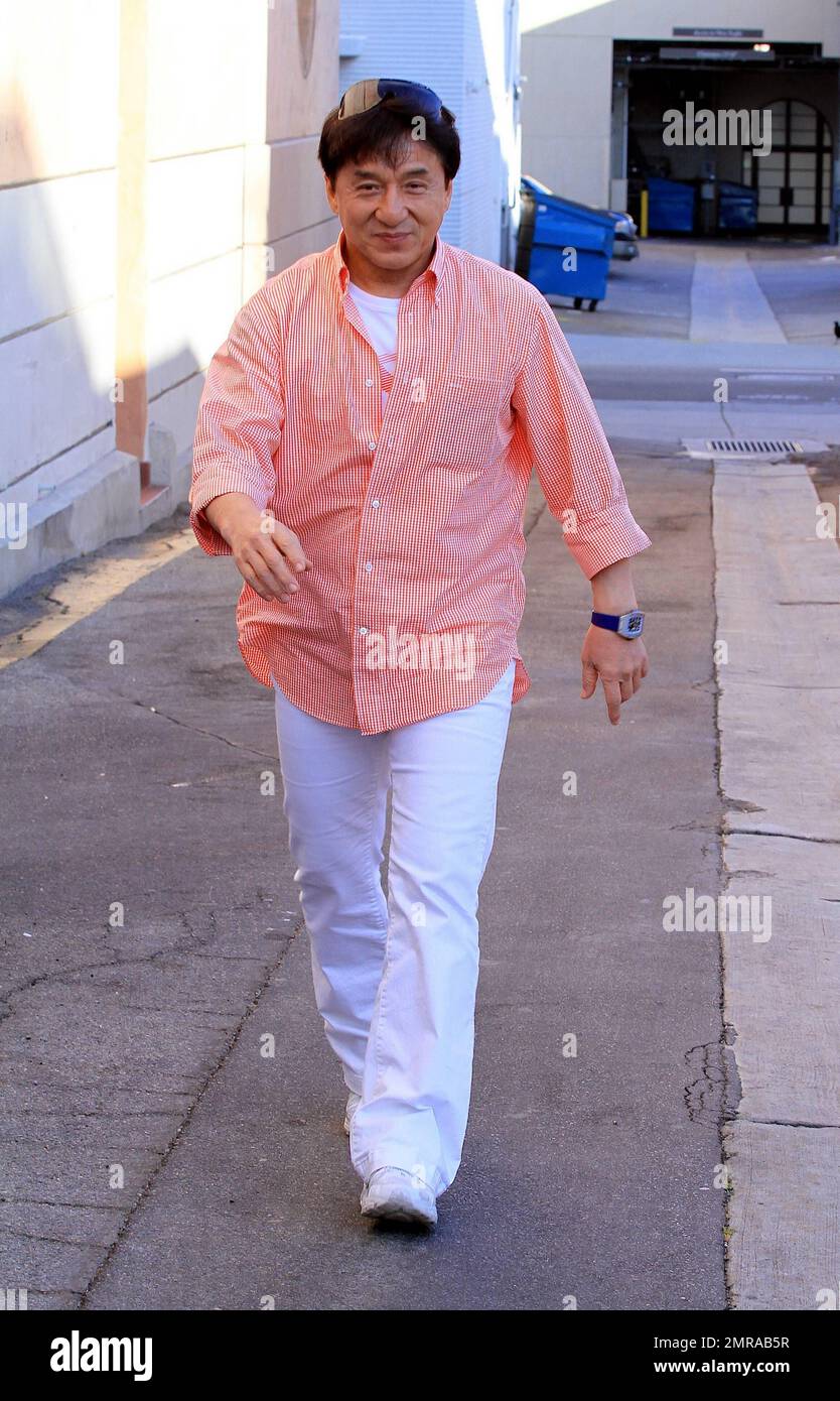 EXCLUSIVE!! Actor Jackie Chan flashes a peace sign and smiles while out ...