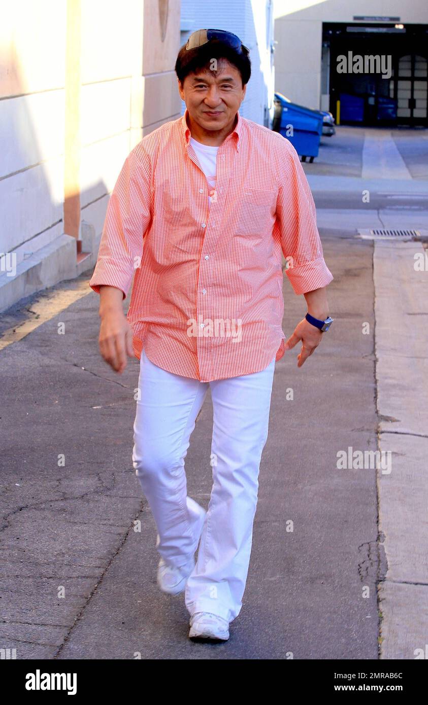EXCLUSIVE!! Actor Jackie Chan flashes a peace sign and smiles while out ...
