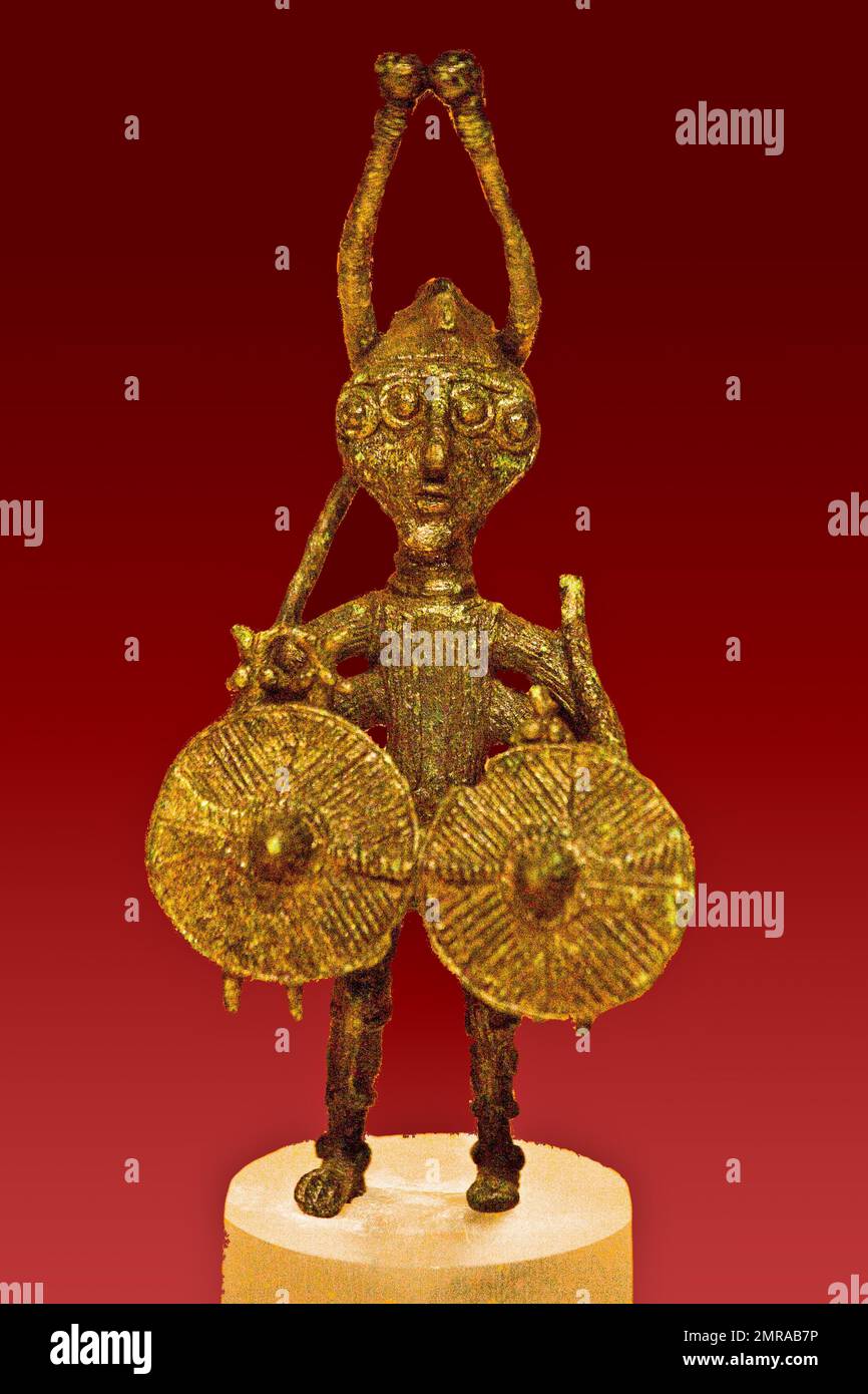 Nuraghic bronze statuette of a demon with four eyes and four arms ...