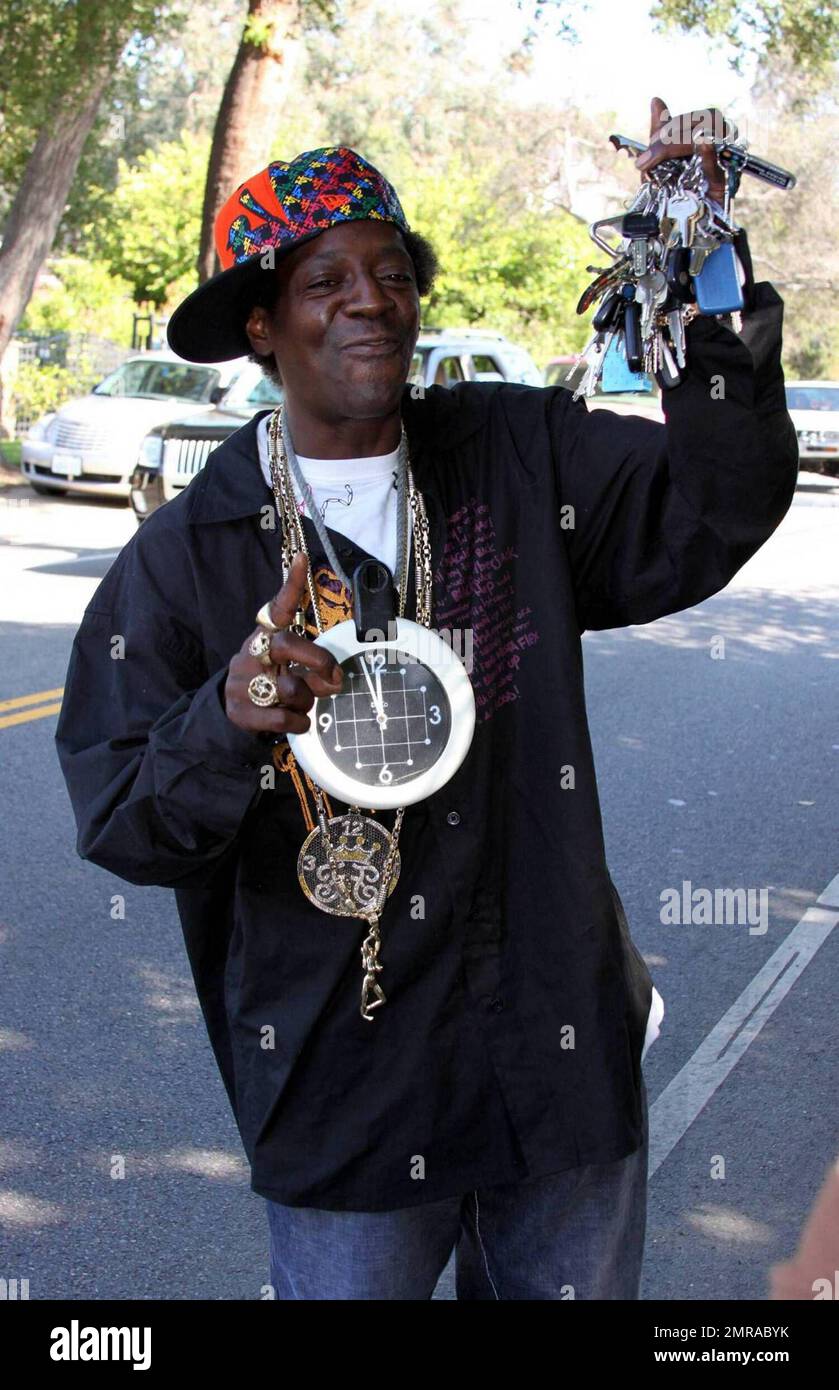 Fans and friends gather outside the Jackson family compound to leave ...