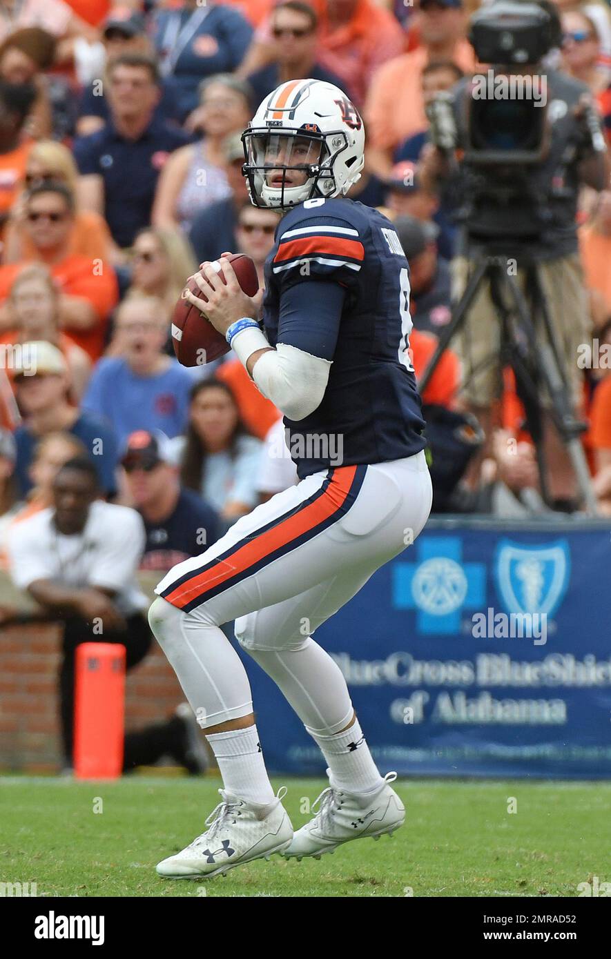 Auburn quarterback Jarrett Stidham (8) looks to pass during the first ...
