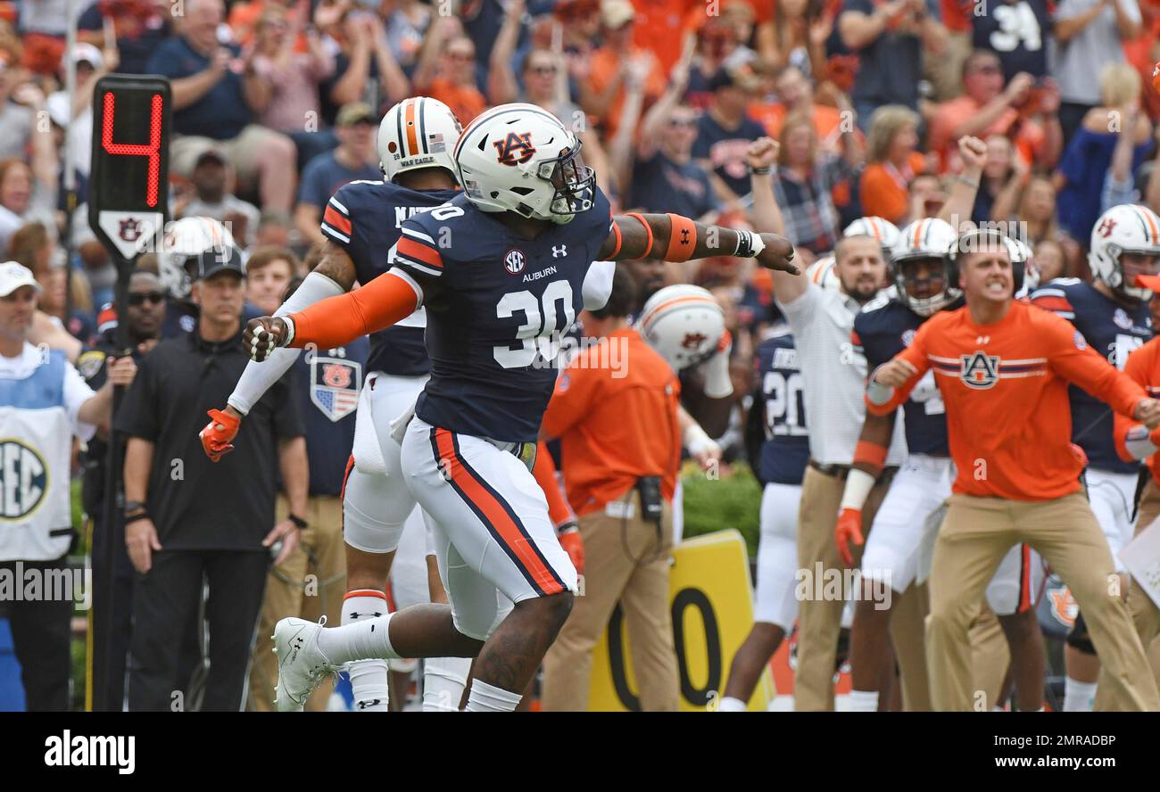 Auburn linebacker Tre' Williams (30) reacts after a missed Mississippi ...