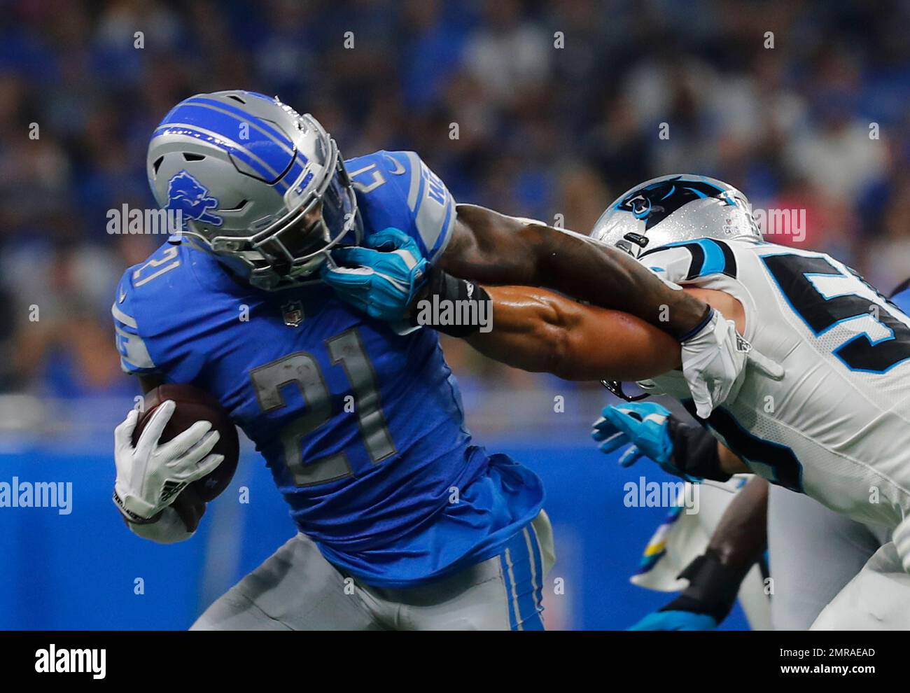 Carolina Panthers middle linebacker Luke Kuechly (59) grabs Detroit ...