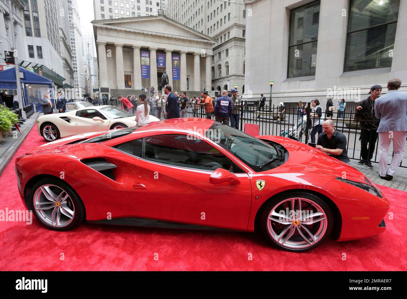 Ferraris are lined up in front of the New York Stock Exchange, Monday ...