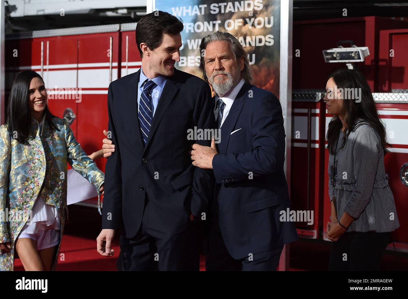 From left, Jennifer Connelly, Joseph Kosinski and Jeff Bridges arrive ...