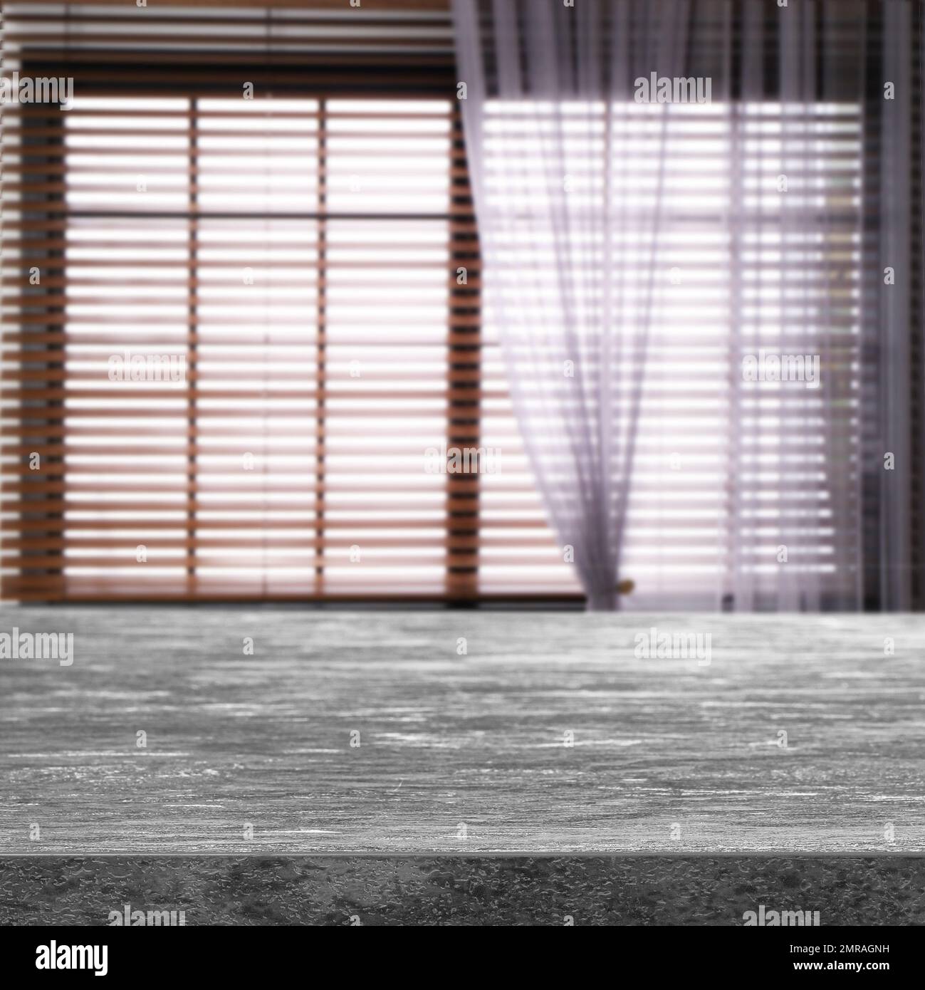 Empty grey stone table in room. Space for design Stock Photo - Alamy
