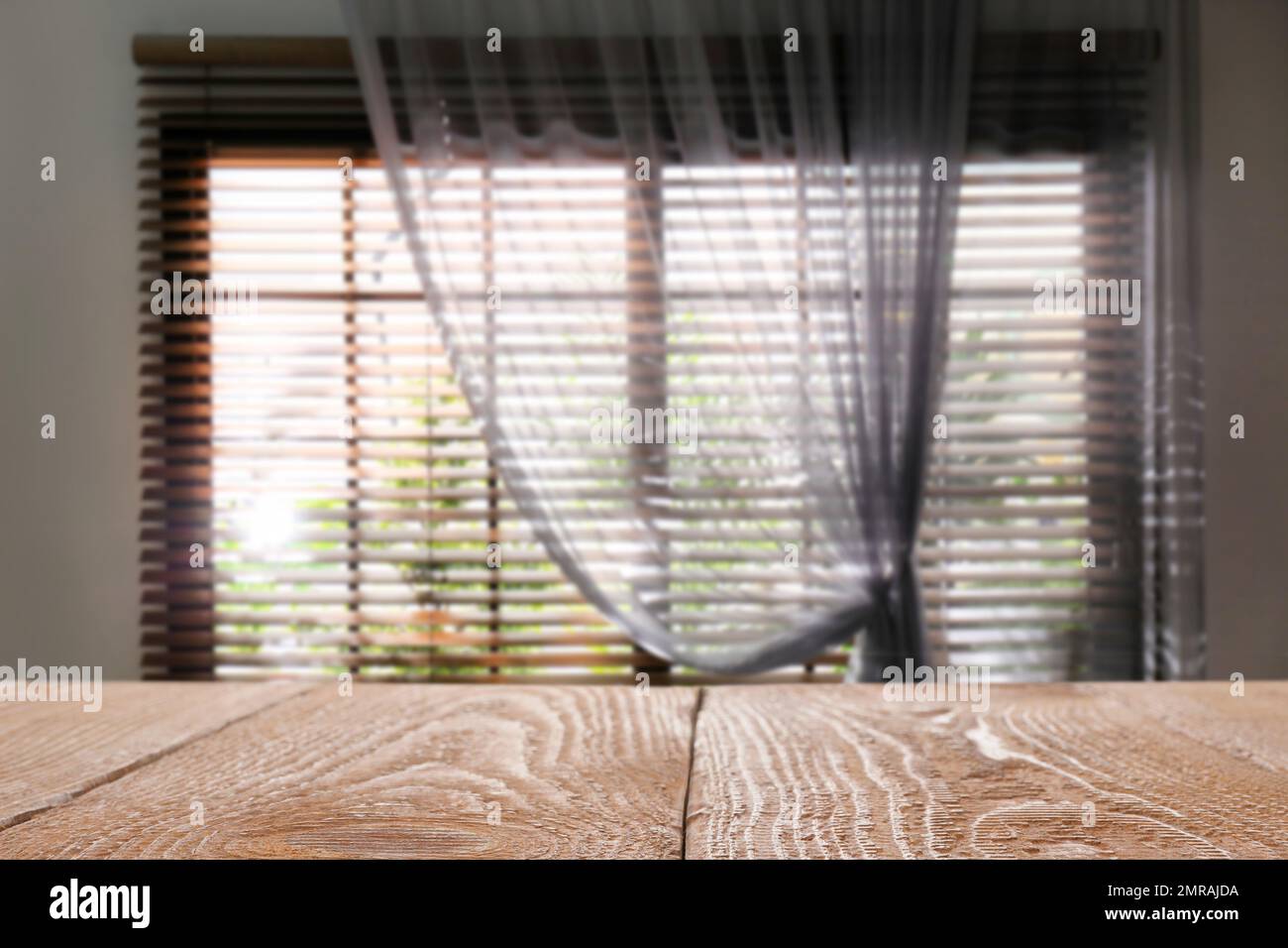 Empty wooden table in room. Space for design Stock Photo - Alamy