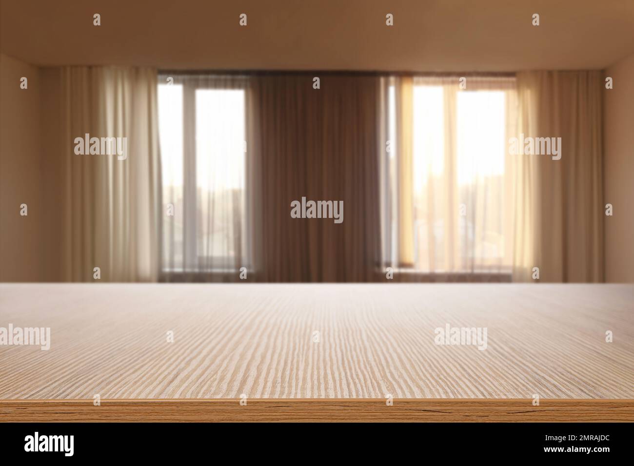 Empty wooden table in room. Space for design Stock Photo - Alamy