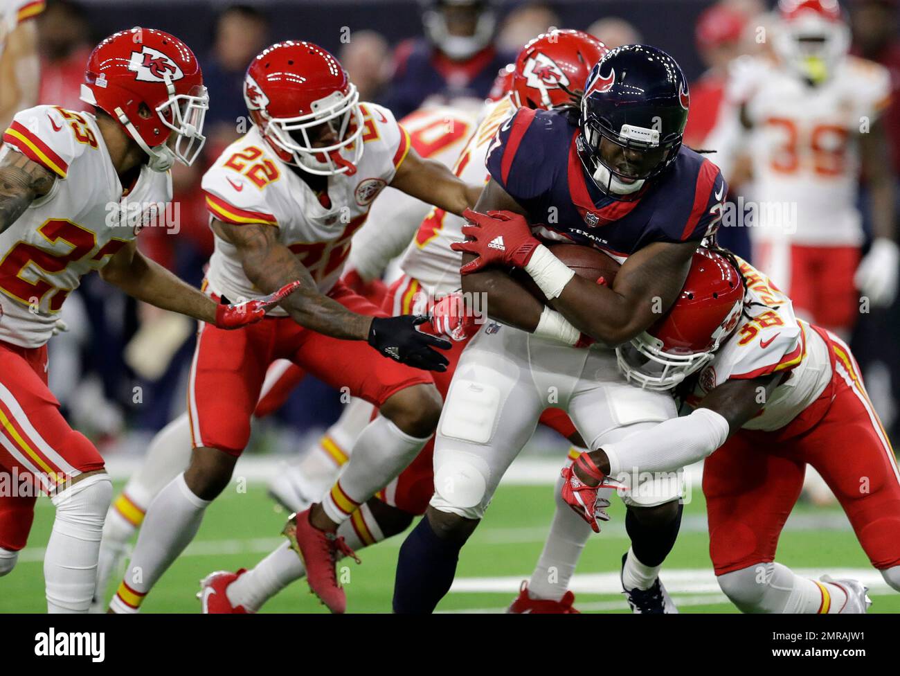 Houston Texans running back D'Onta Foreman (27) is hit by Kansas City ...